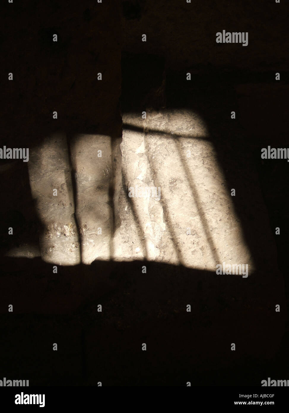 shadow of window with bars Stock Photo - Alamy
