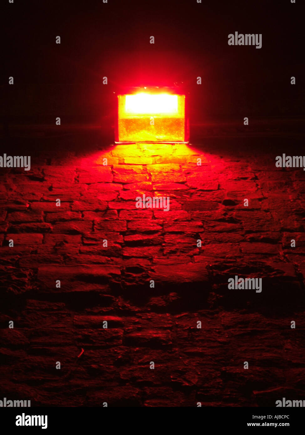one red spotlight at night Stock Photo - Alamy