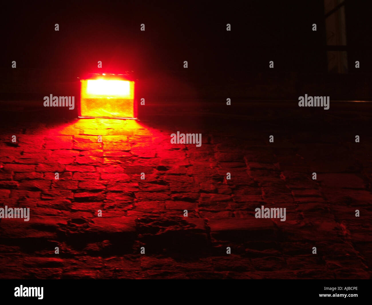 one red spotlight at night Stock Photo - Alamy