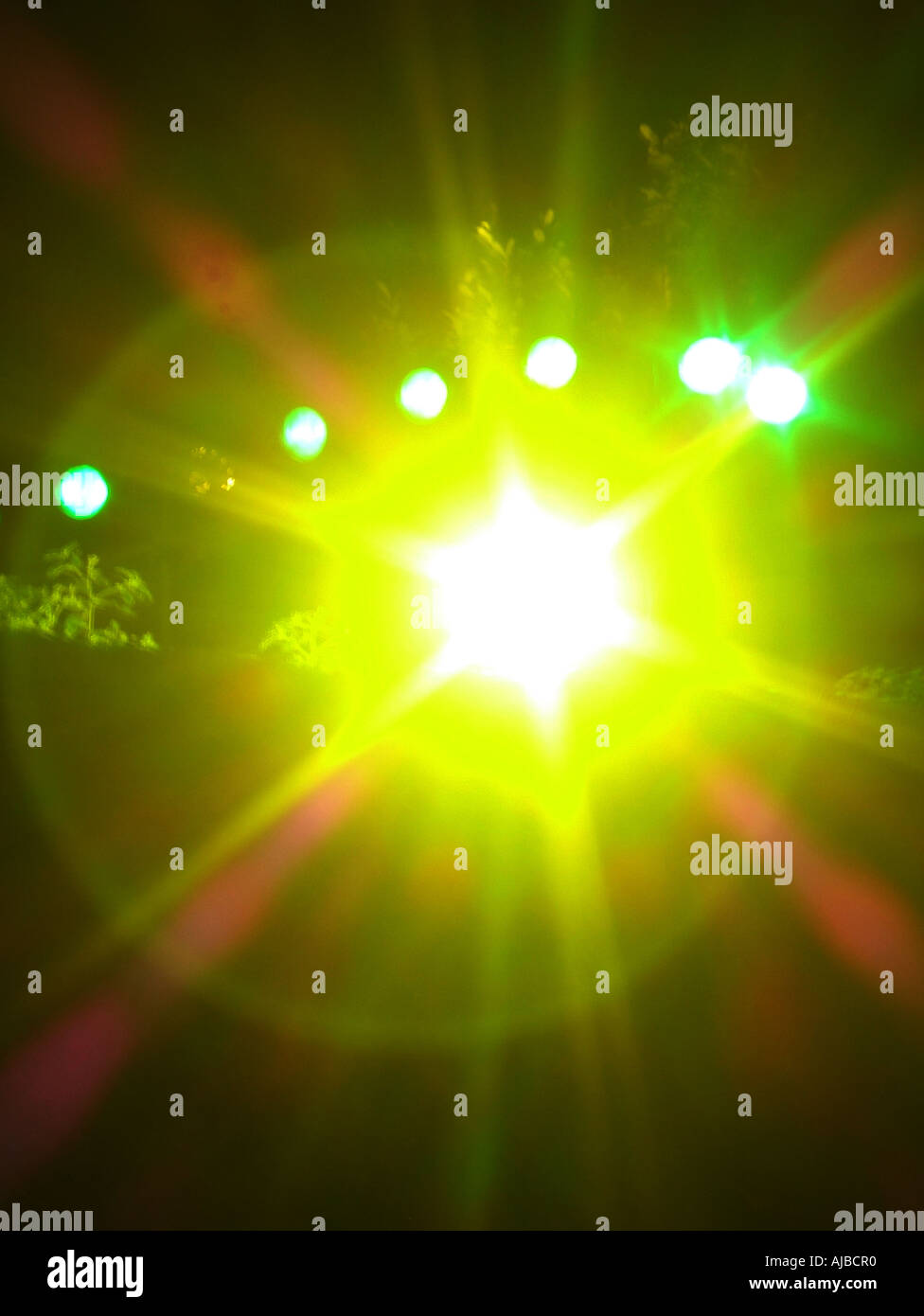 bright orange spotlight and dark background Stock Photo - Alamy