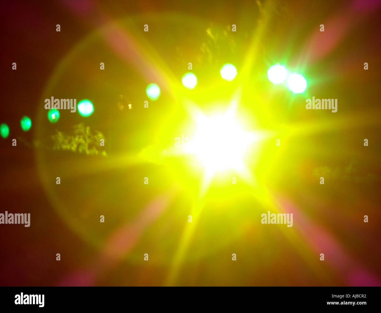 bright orange spotlight and dark background Stock Photo - Alamy