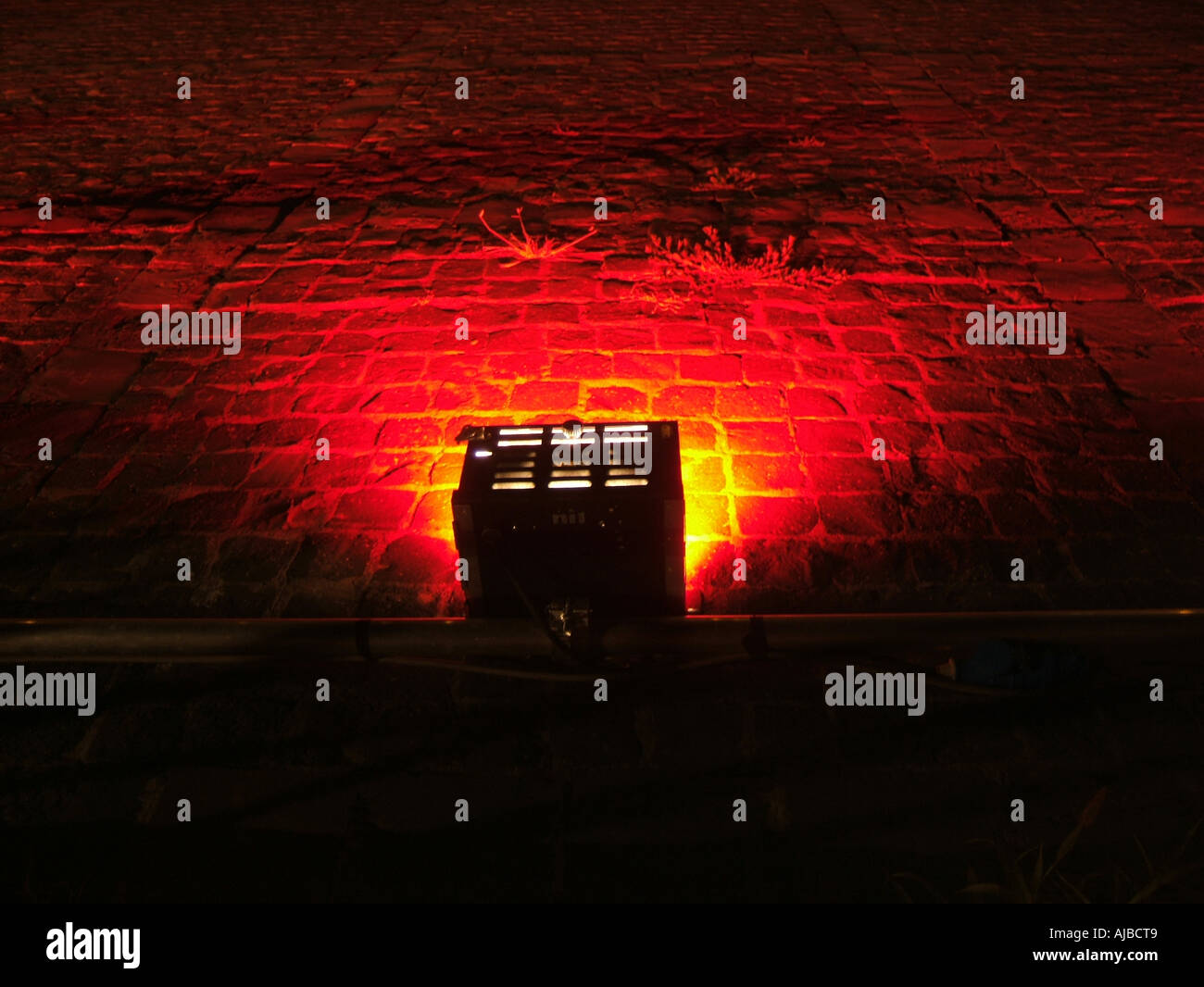 one red spotlight at night Stock Photo - Alamy