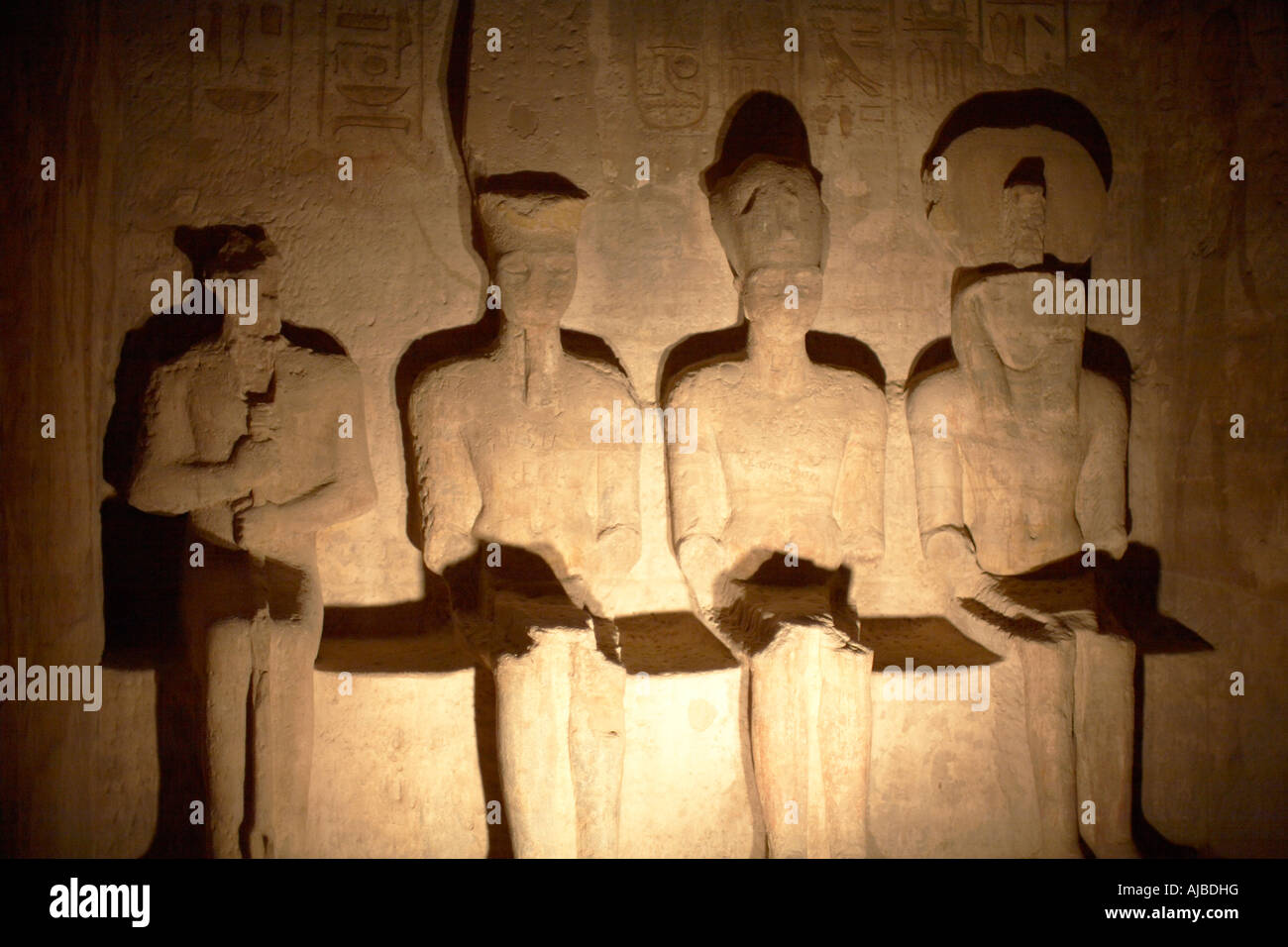 Carved statues of Ptah Amun Ra Ramses II and Ra Horakhty in furthest ...