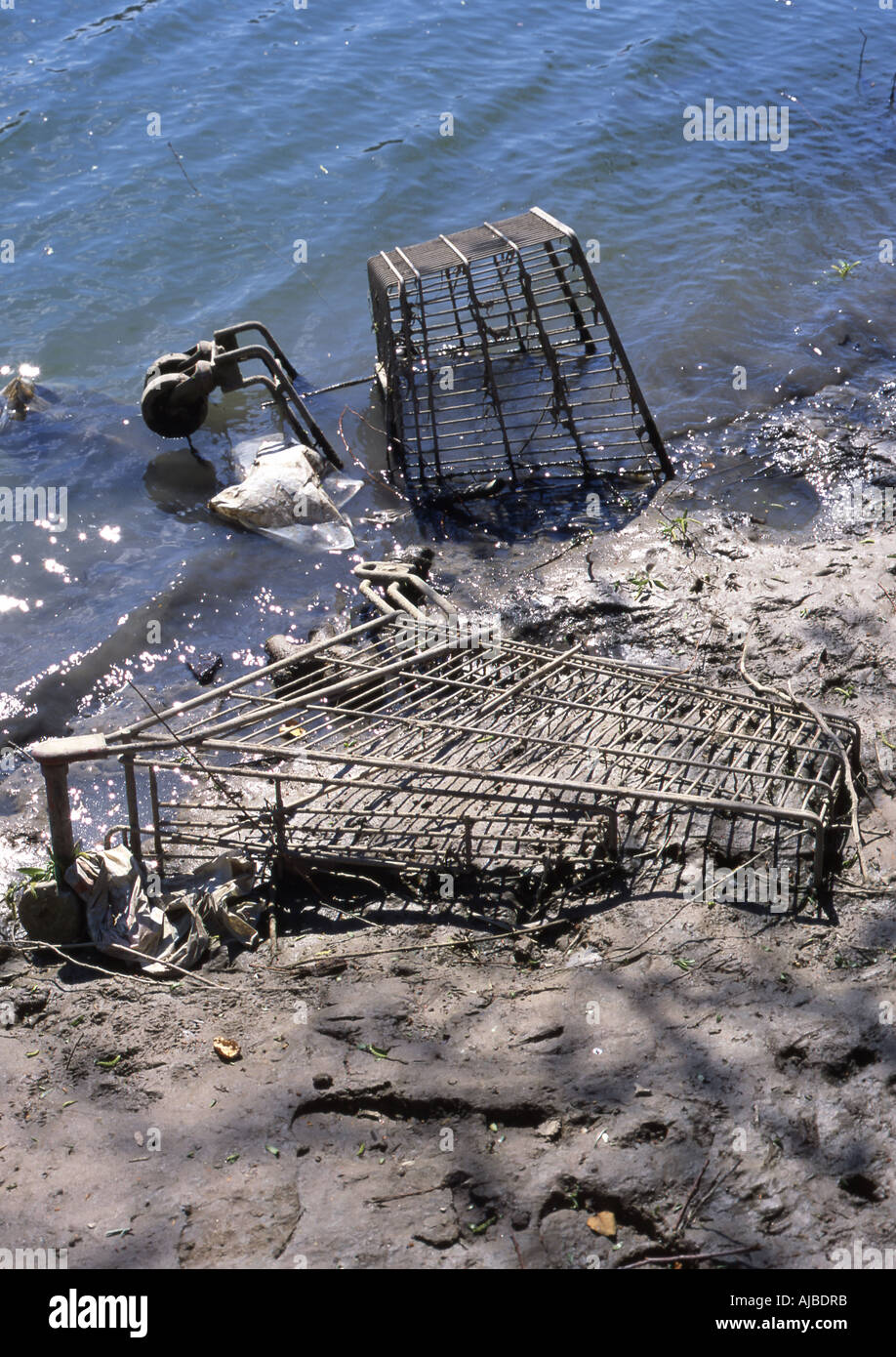 Supermarket trolley in mud hi-res stock photography and images - Alamy