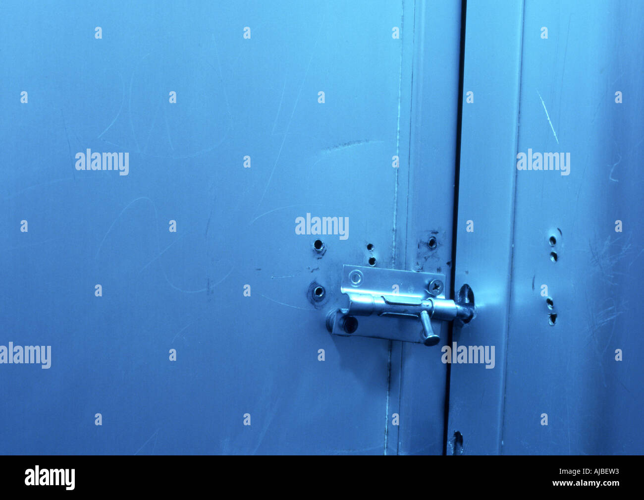 locked metal toilet door cubicle Stock Photo - Alamy