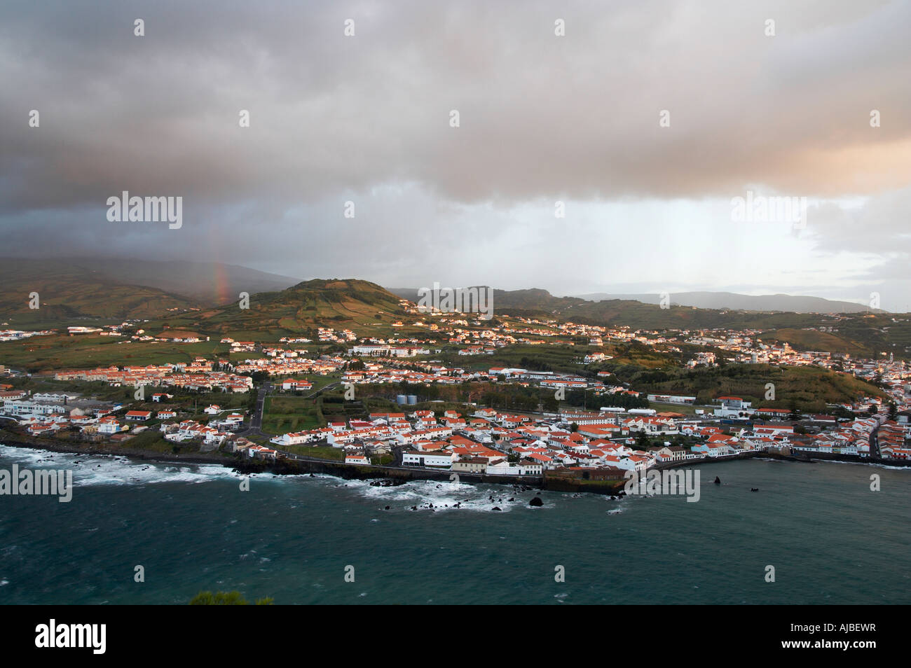 Storm clouds and rainbow over Horta, Faial island, The Azores Stock ...