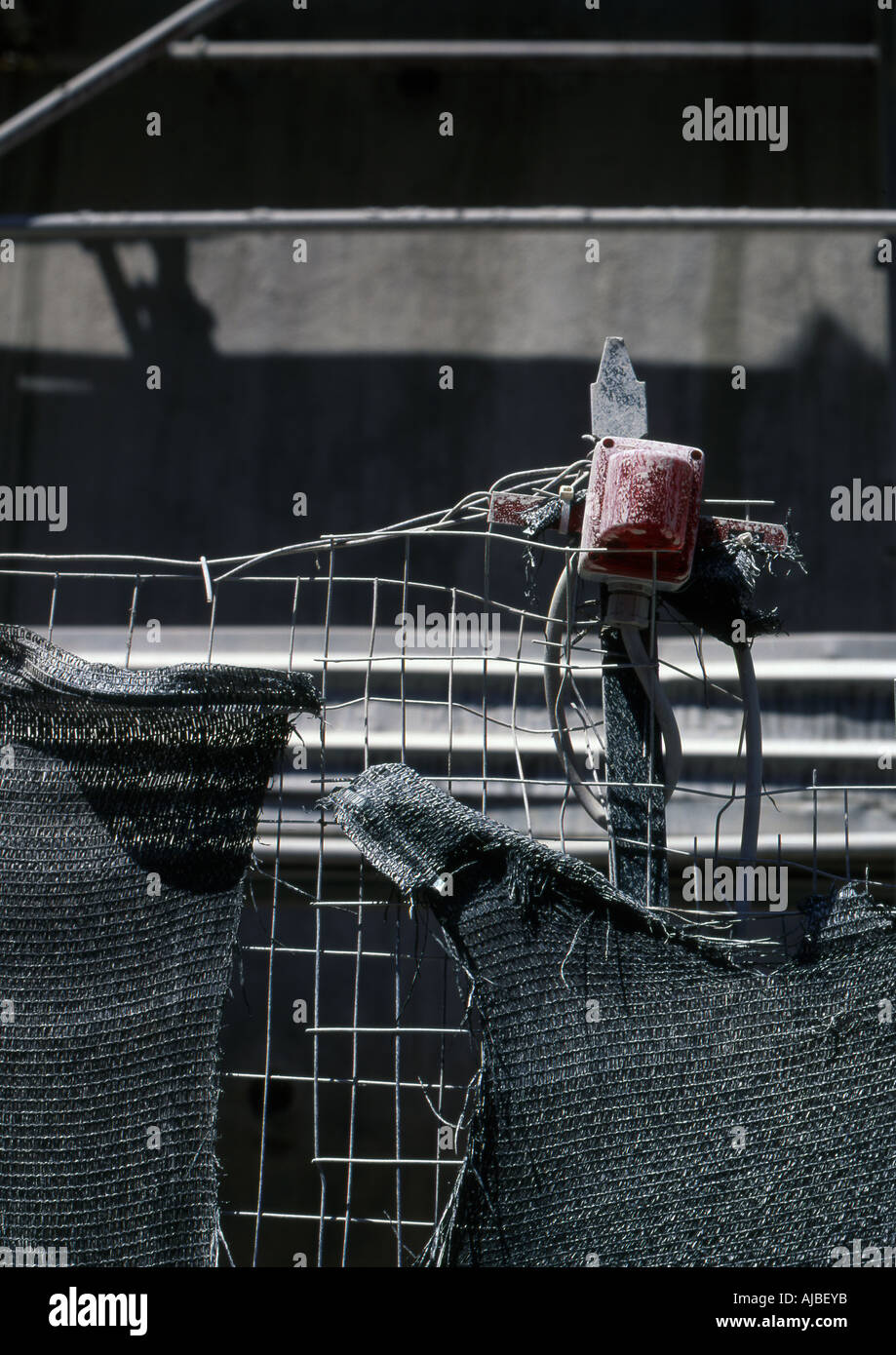 building site with scaffolding red warning light Stock Photo - Alamy