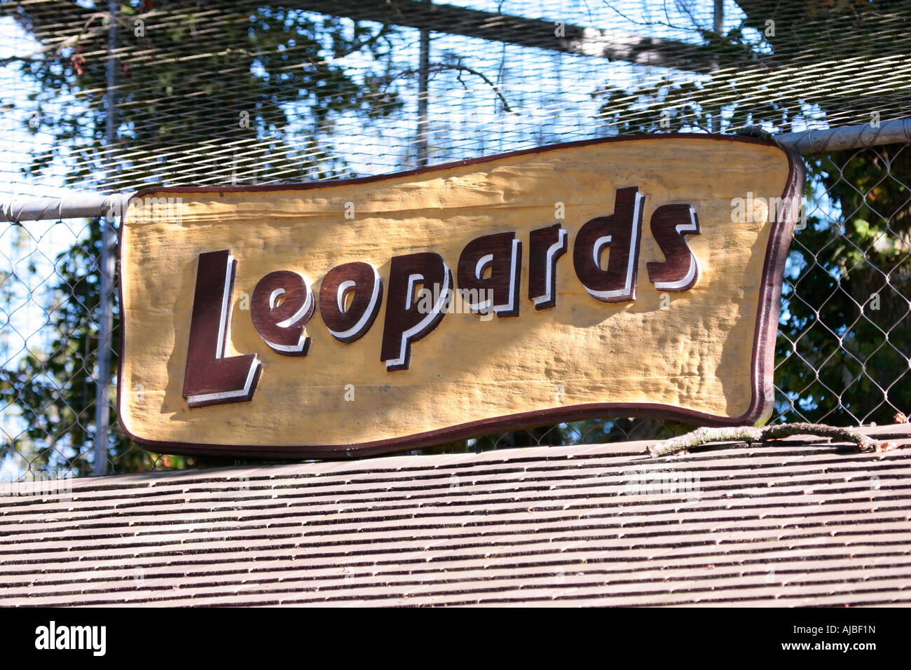 Painted wooden sign in Marwell Zoo for Leopard enclosure Stock Photo ...