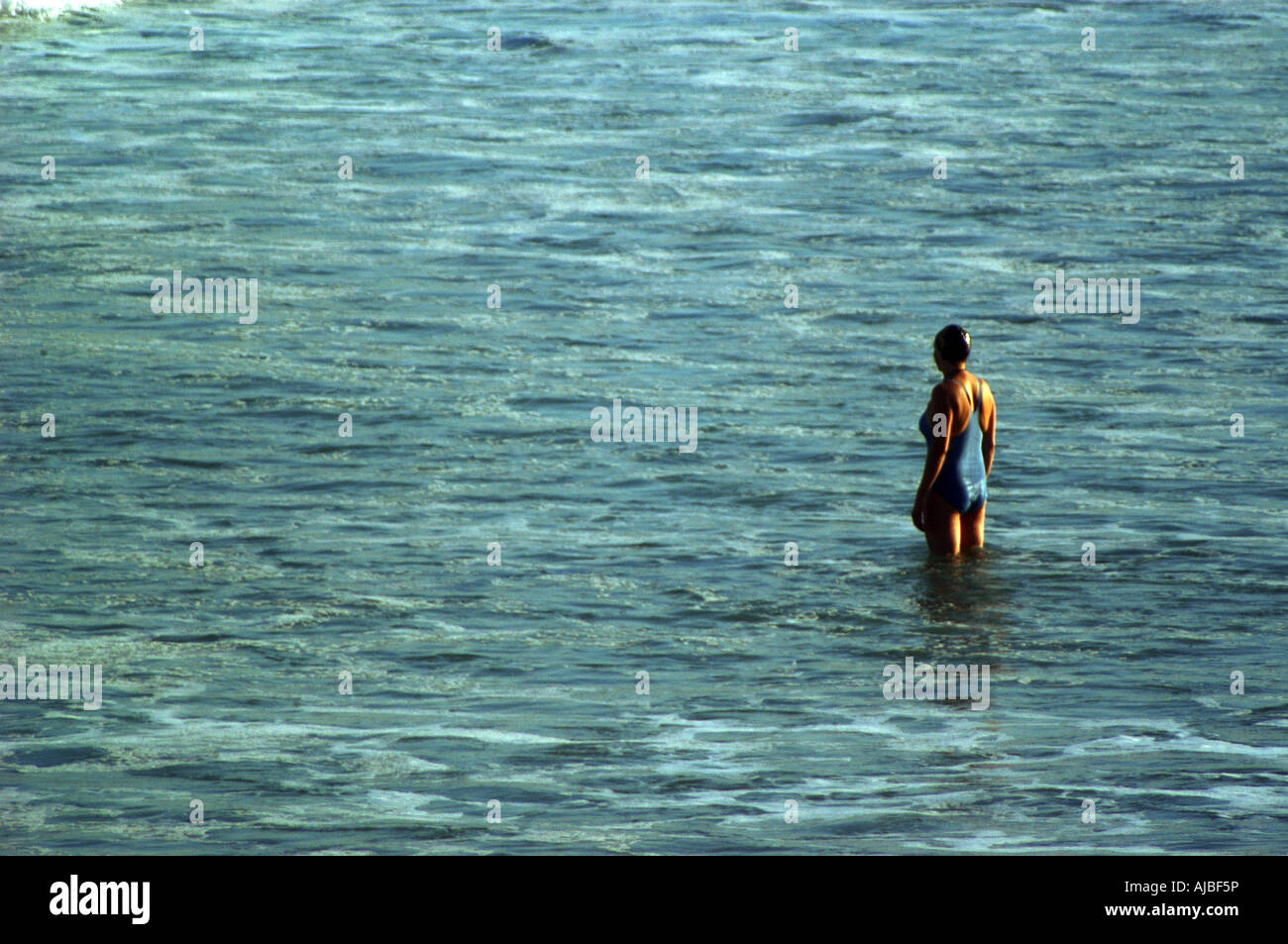 woman going to swim in sea Stock Photo - Alamy