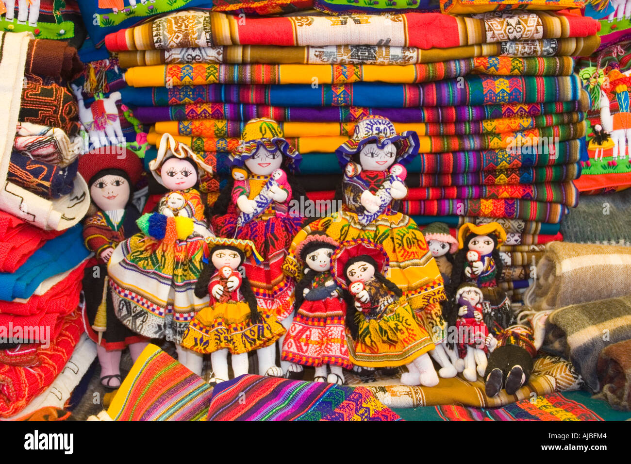 Traditional Peruvian dolls and fabrics textiles on sale in Pisac market ...