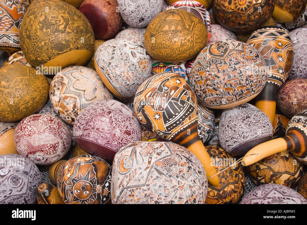 Traditional Peruvian decorative carved gourds on sale in Pisac market ...