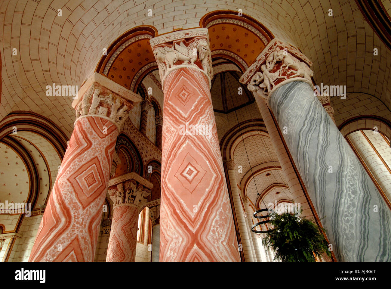 Decorative columns inside XI-XII century Romanesque colliegiate church ...