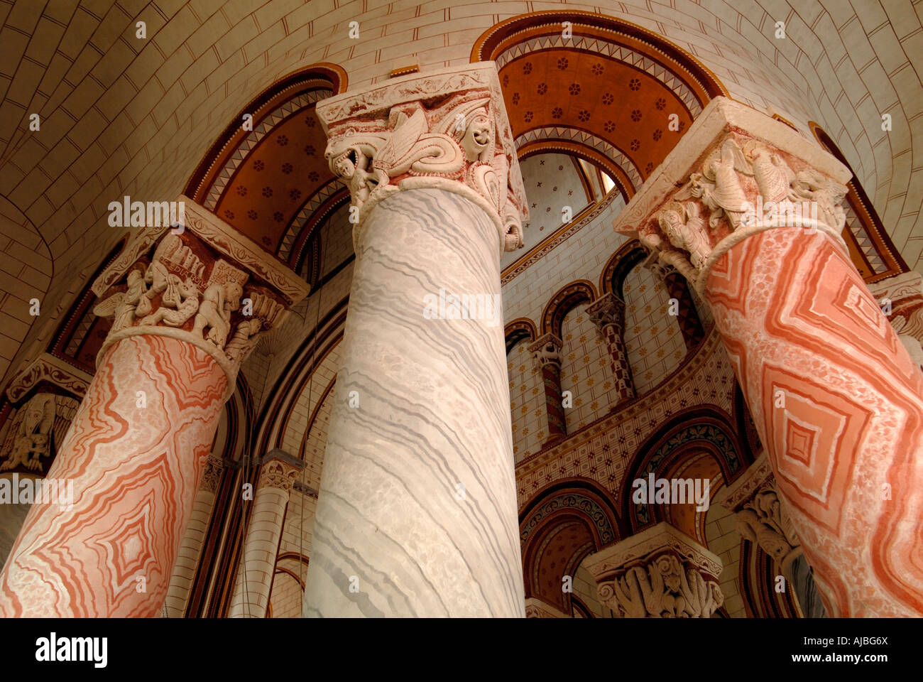 Decorative columns inside XI-XII century Romanesque colliegiate church ...