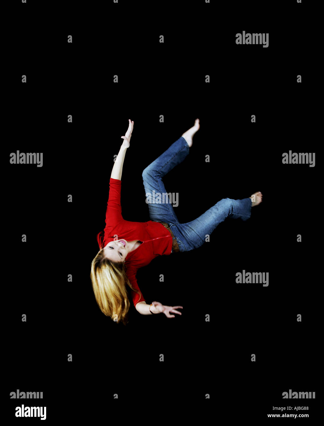 Young Woman Falling Action Motion Black Background Black Space Stock ...