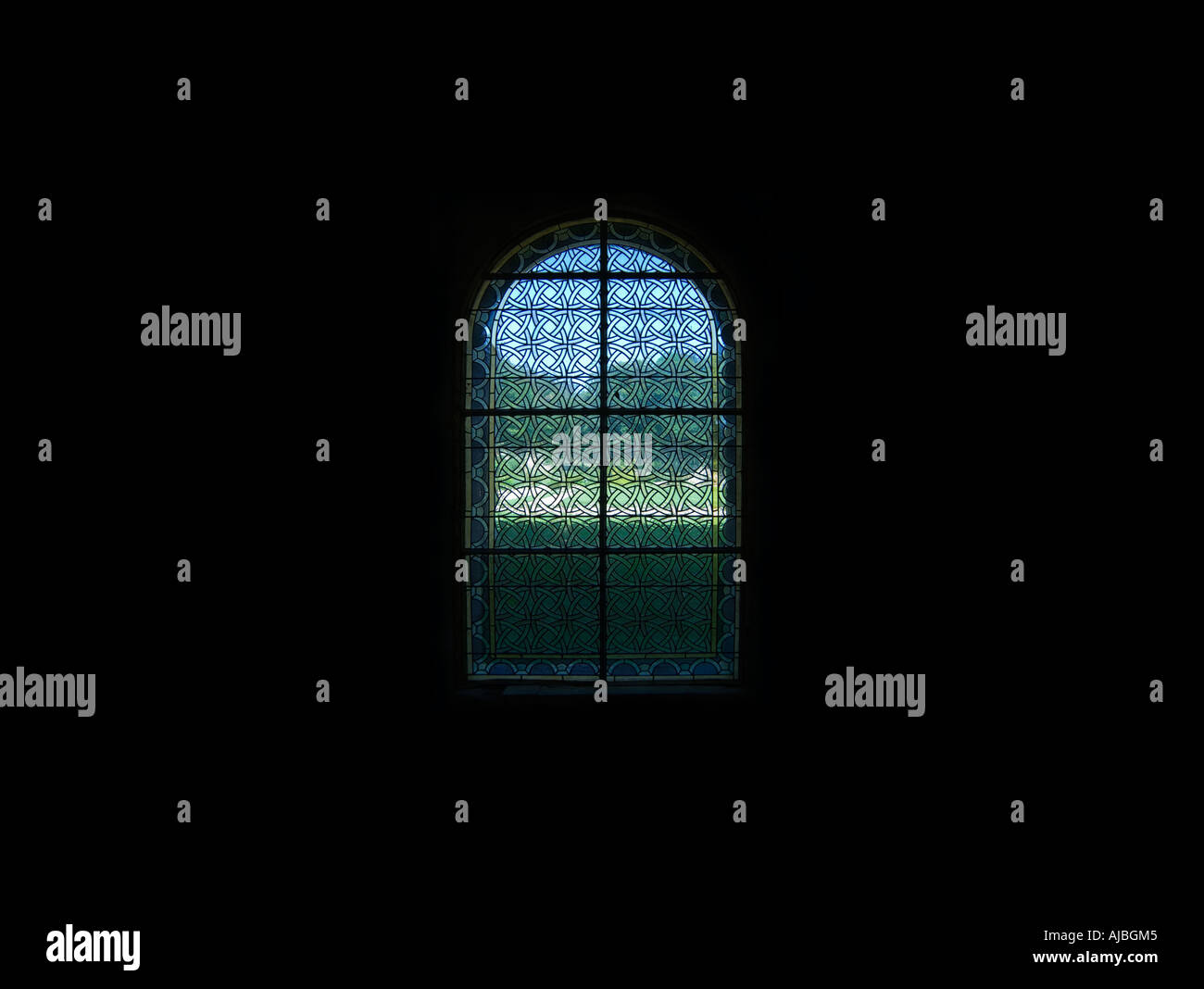 view through a medieval leaded light window from a black interior Stock ...