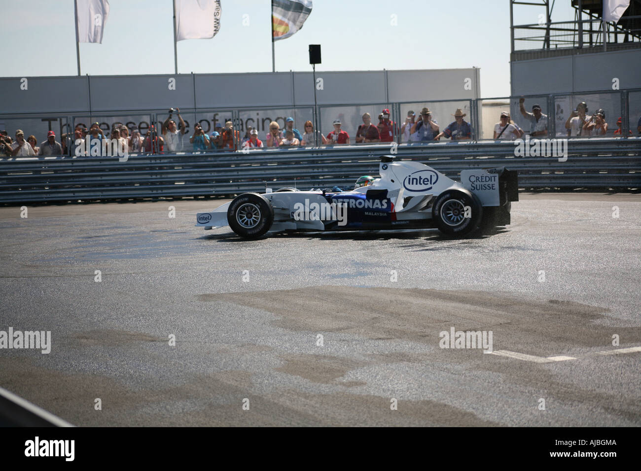 Picture shows BMW F1 car doing burn outs in BMW Sauber Pit Lane Park ...