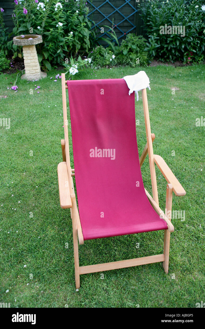 Deckchair in suburban garden, England Stock Photo - Alamy