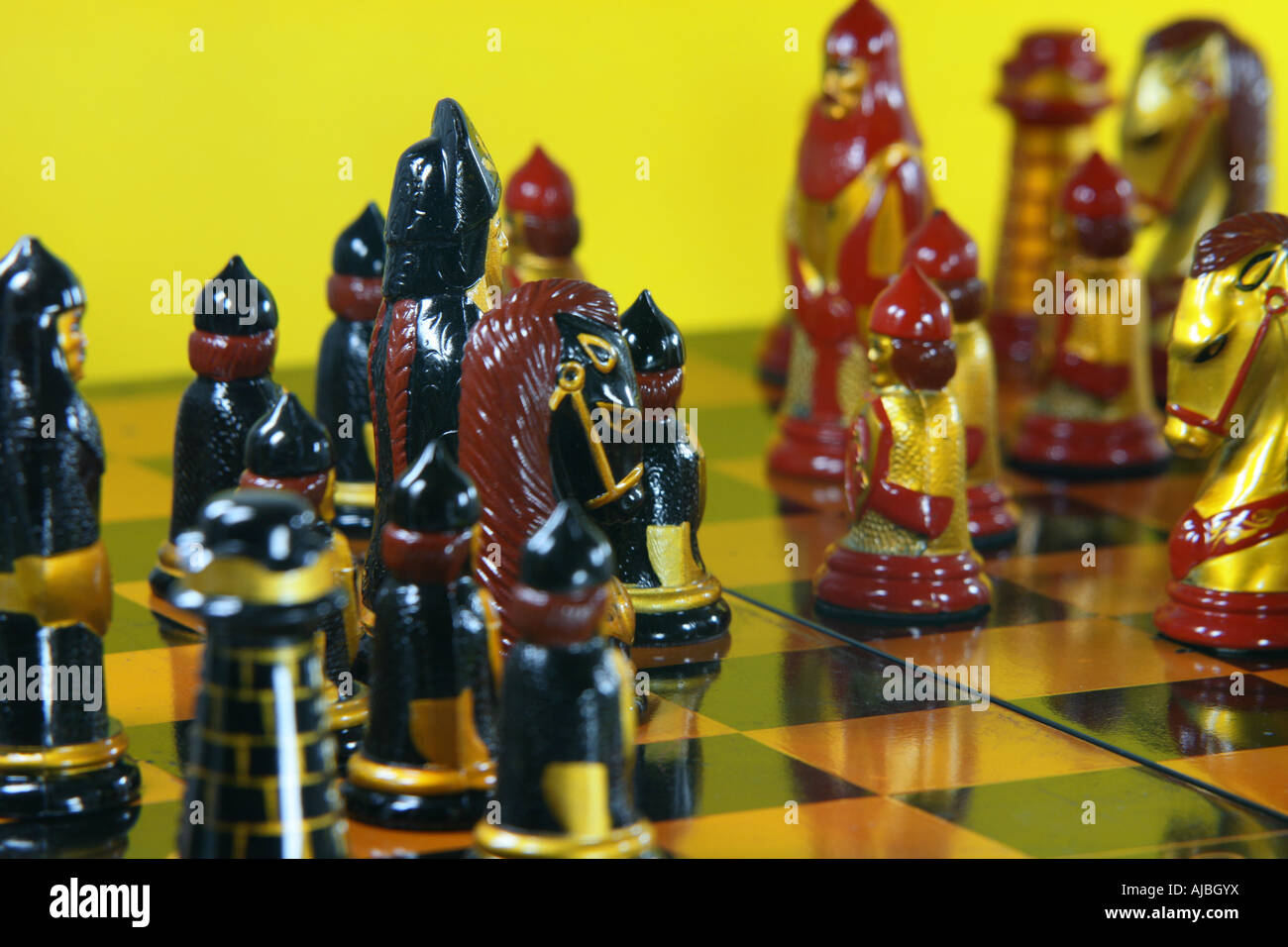 battle board games leisure concepts chess in yellow Stock Photo - Alamy