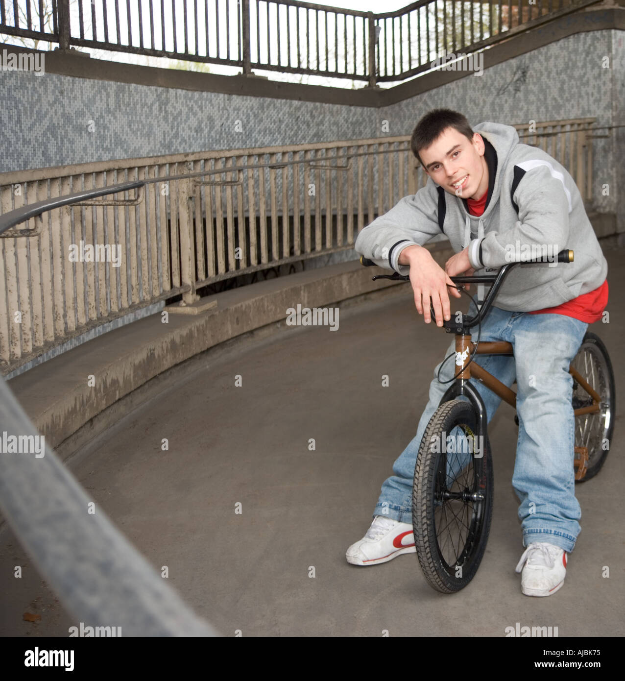 Young man sitting on bmx hi-res stock photography and images - Alamy