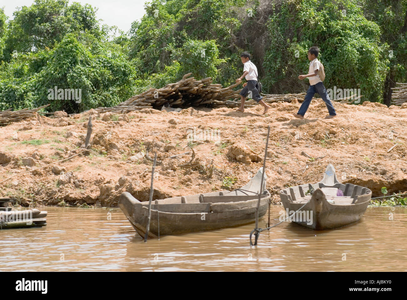 Cambodia Young Boys Walking Along River Bank Siem Reap Stock Photo - Alamy