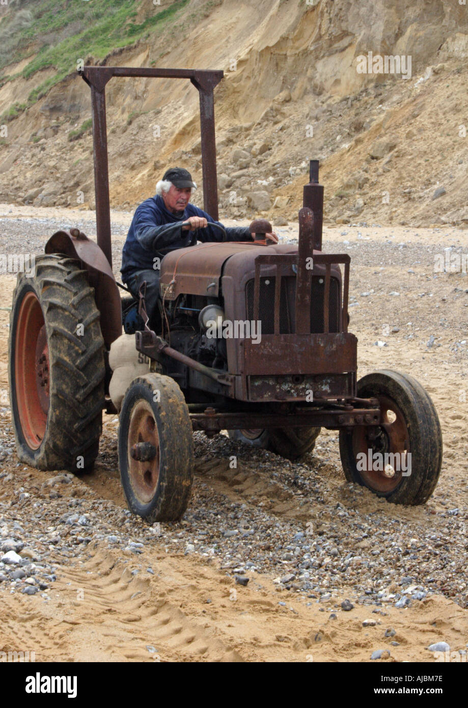 One man and his tractor Stock Photo - Alamy