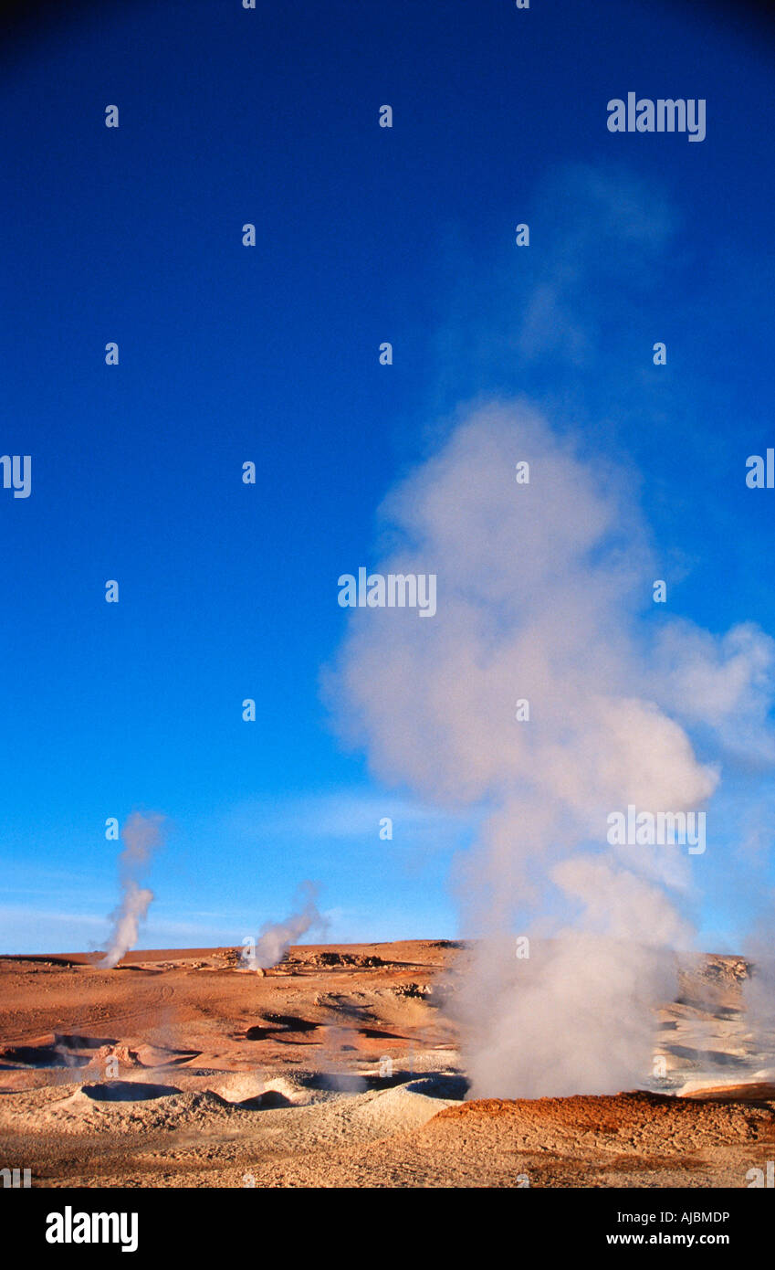 Portrait of Natural Geysers Steaming at Sunrise Stock Photo - Alamy