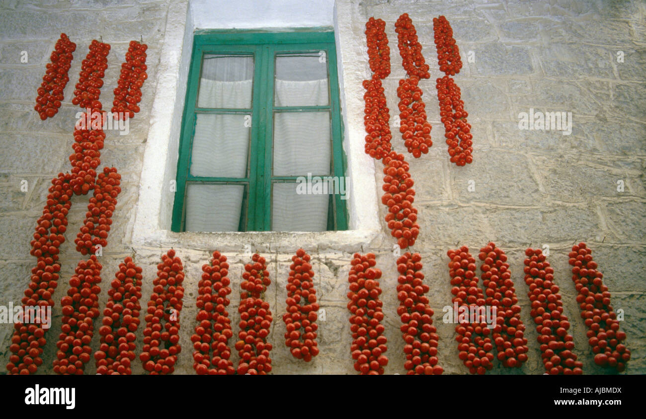 Tomatoes Hanging Outside a Window to Dry Stock Photo - Alamy