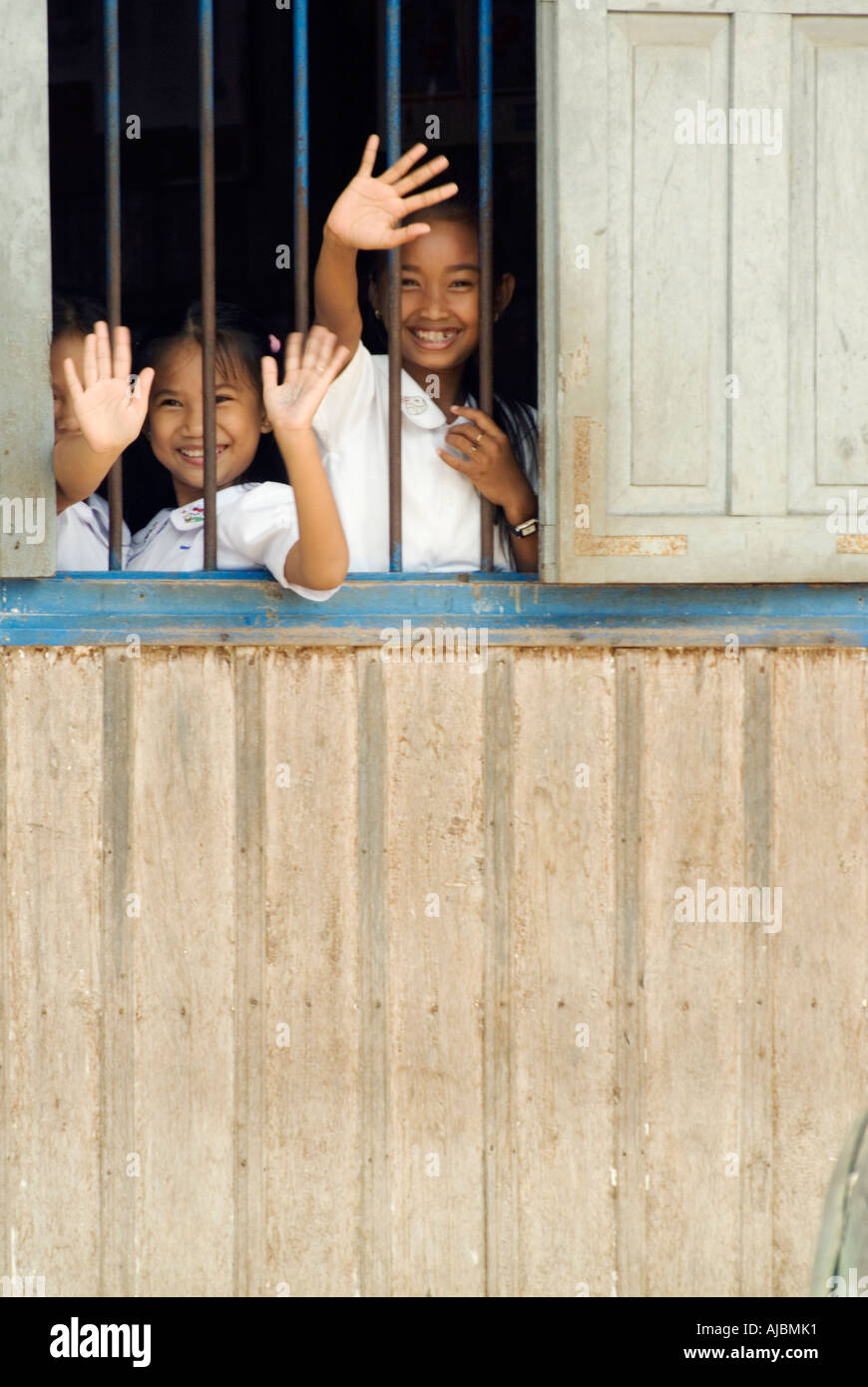 Children waving classroom asia hi-res stock photography and images - Alamy