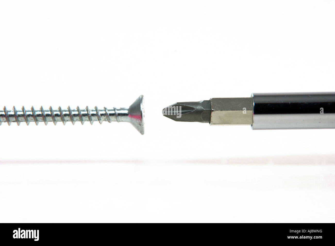 hardware tools screw and screwdriver in white background Stock Photo ...