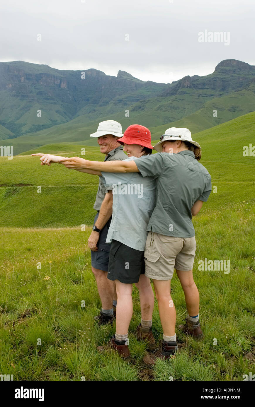 Group of People Pointing Something Out Stock Photo - Alamy