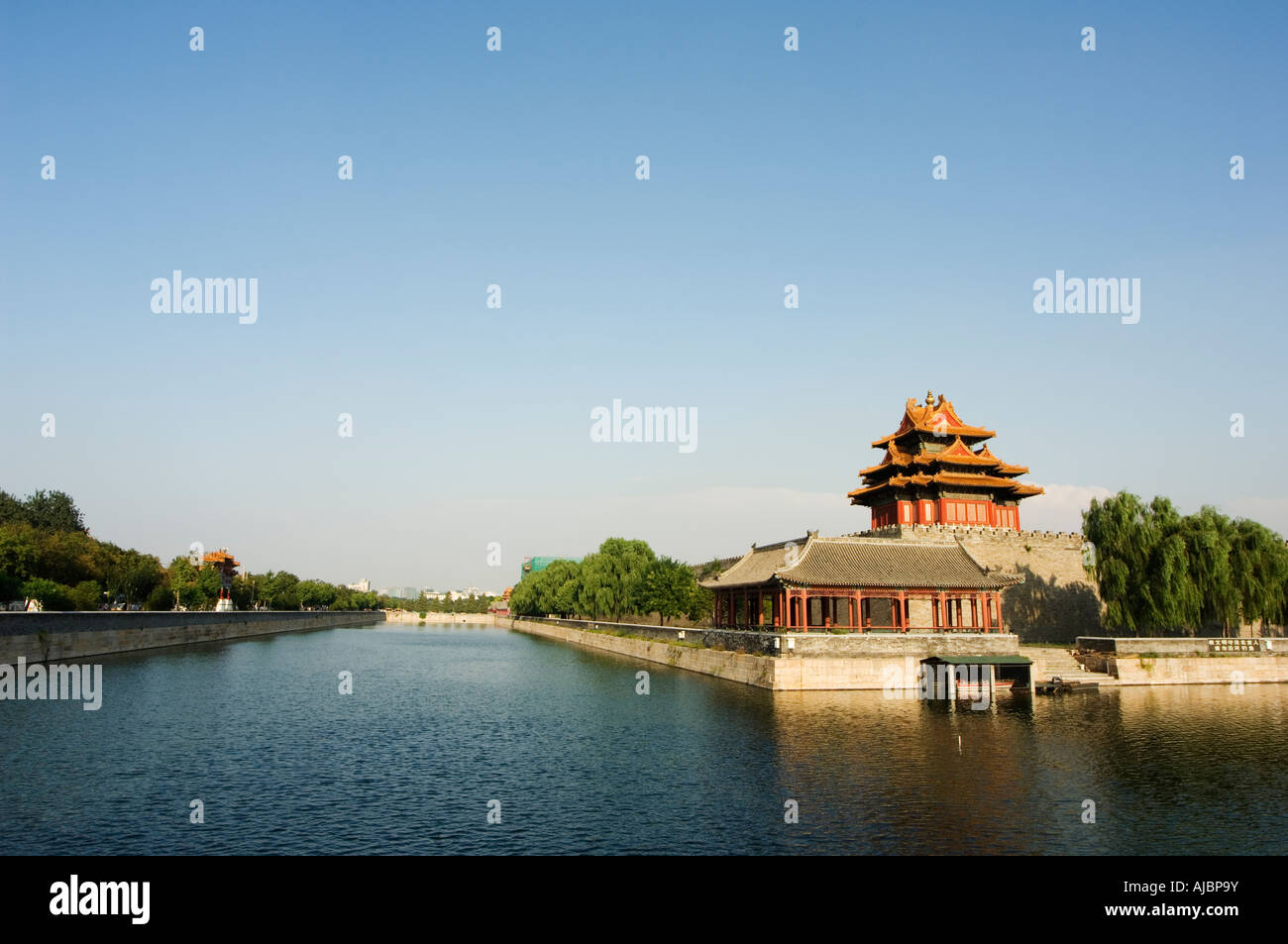 A Palace Wall Tower surrounded by the moat of The Forbidden City Palace ...