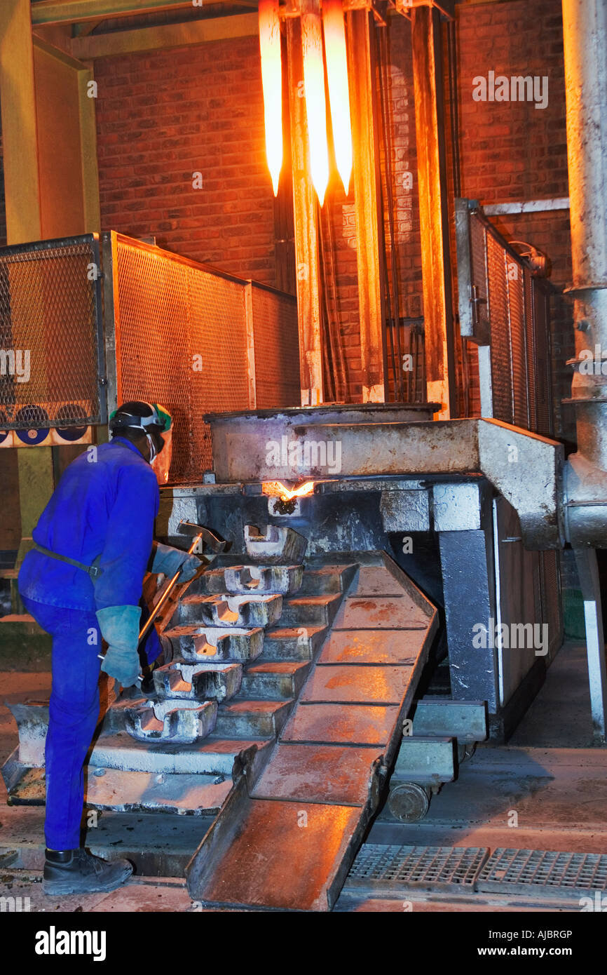 Mine Worker Pouring Gold Stock Photo - Alamy