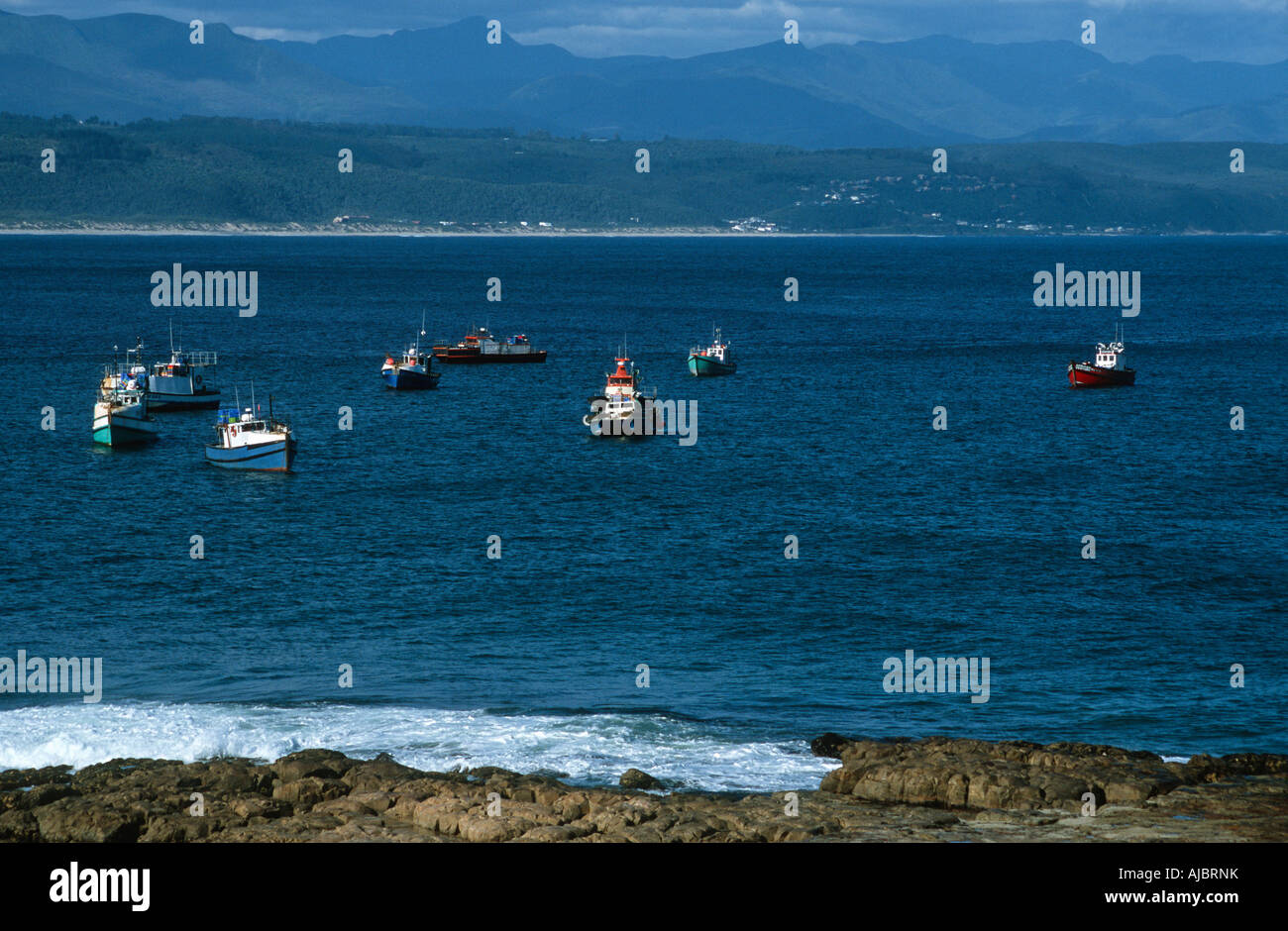 Trawlers in Bay Stock Photo - Alamy