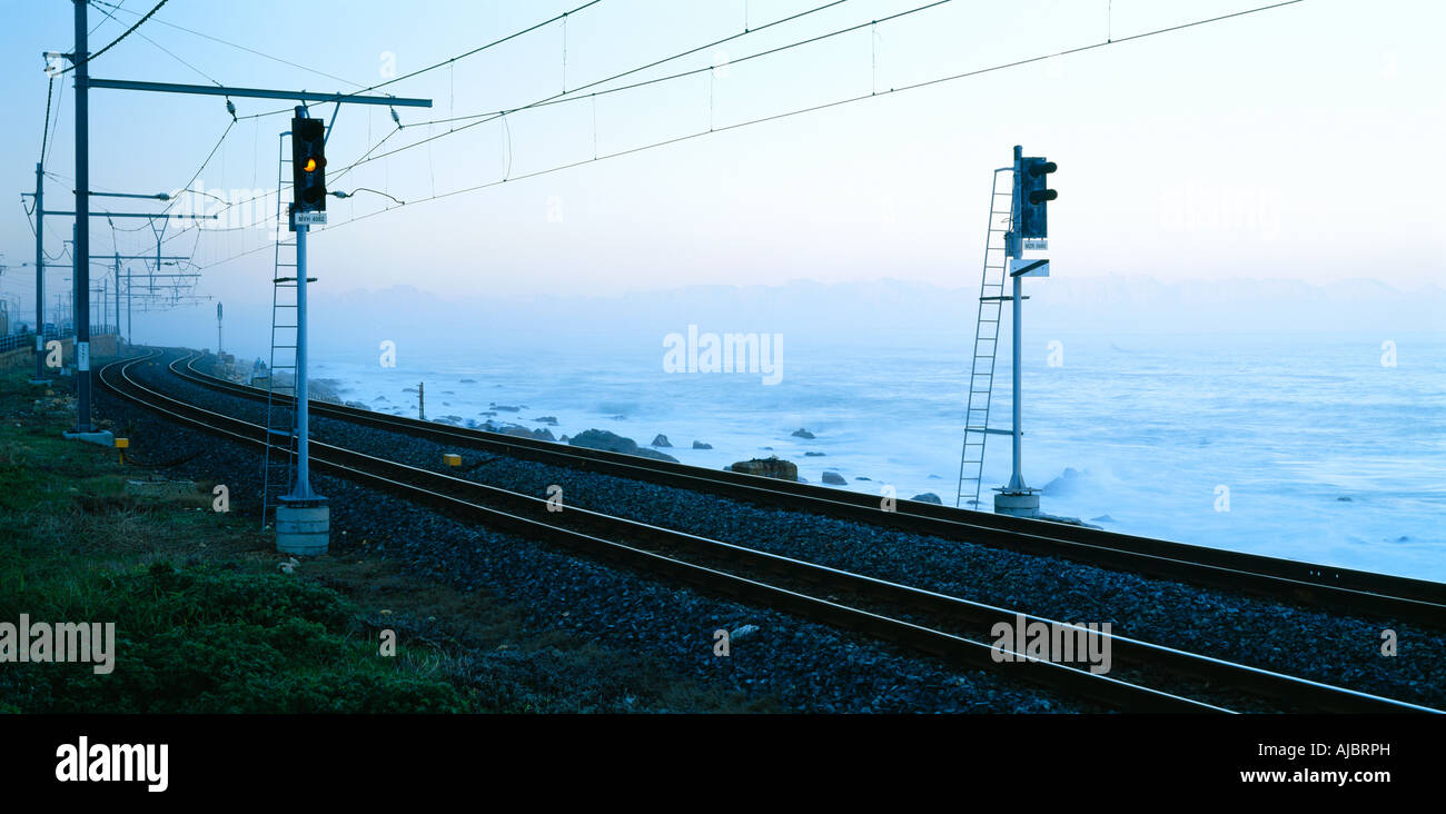 View Over Rail Tracks and Misty Ocean Stock Photo - Alamy