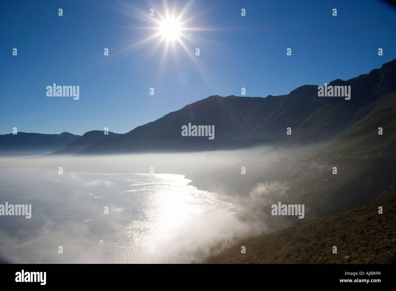 Misty Coastal Scene at Sunset Stock Photo - Alamy