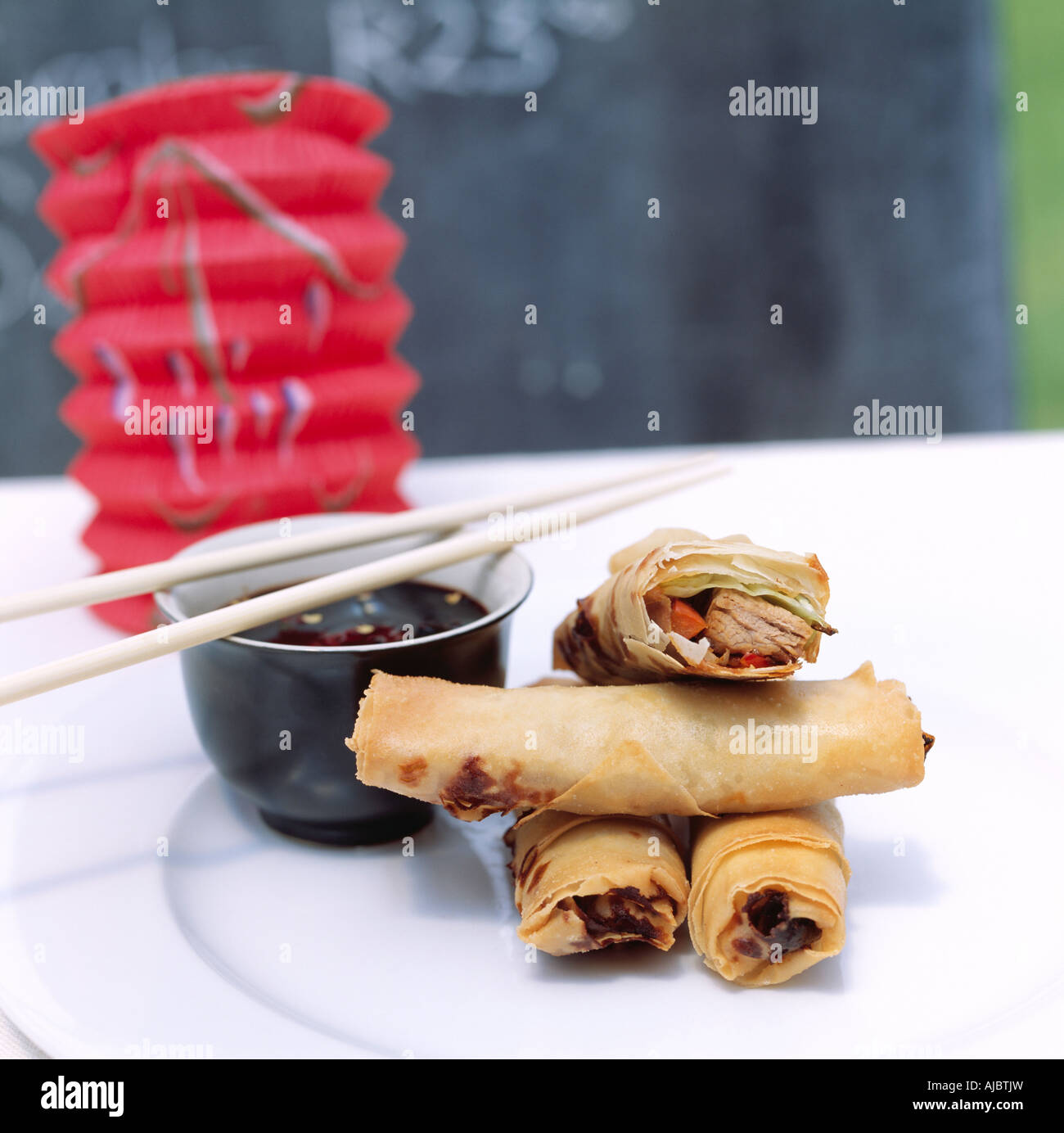 Stacked Spring Rolls and Chopsticks Stock Photo - Alamy