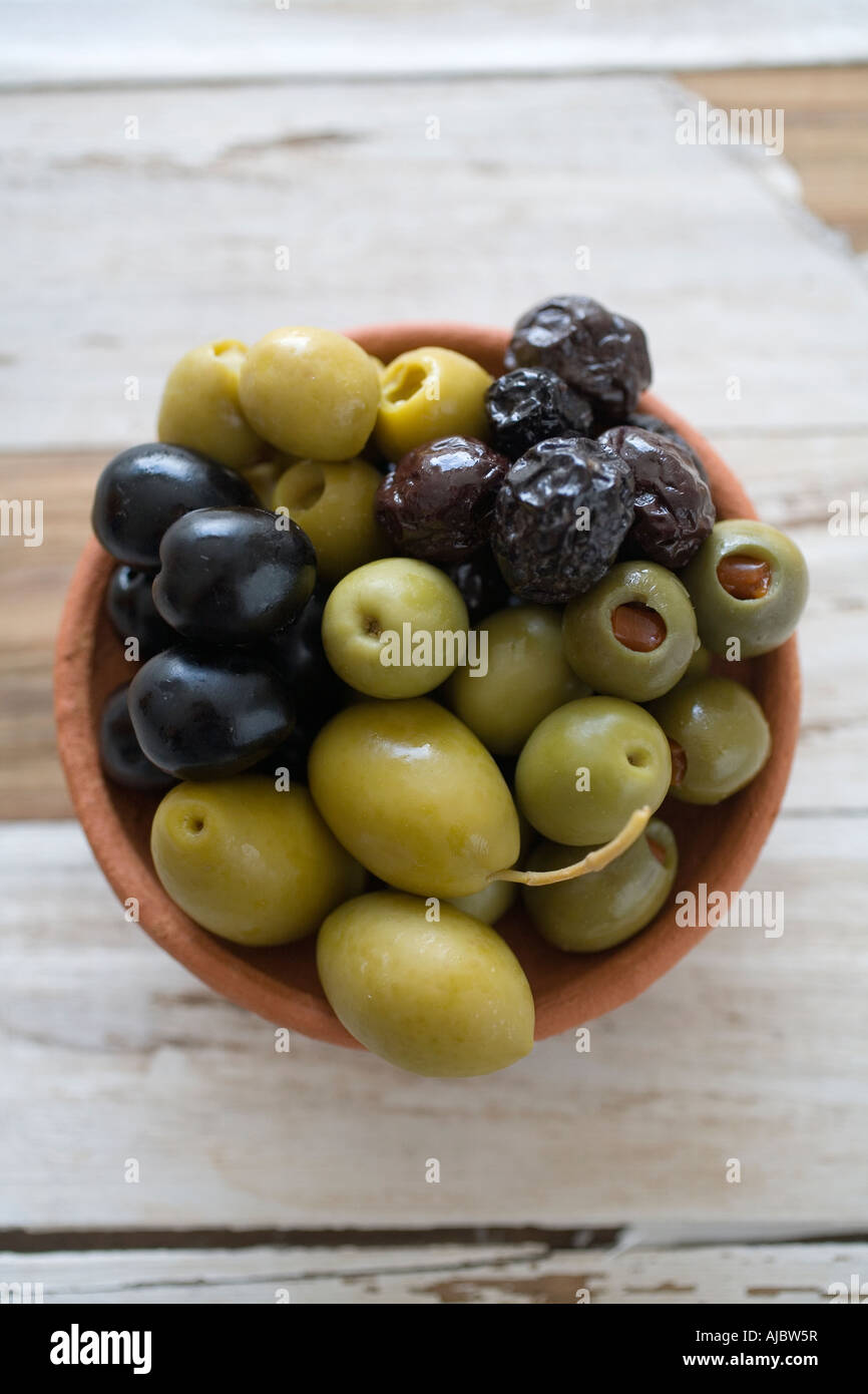 Overhead View of Green;Black And Calamata Olives in a Small Ceramic ...