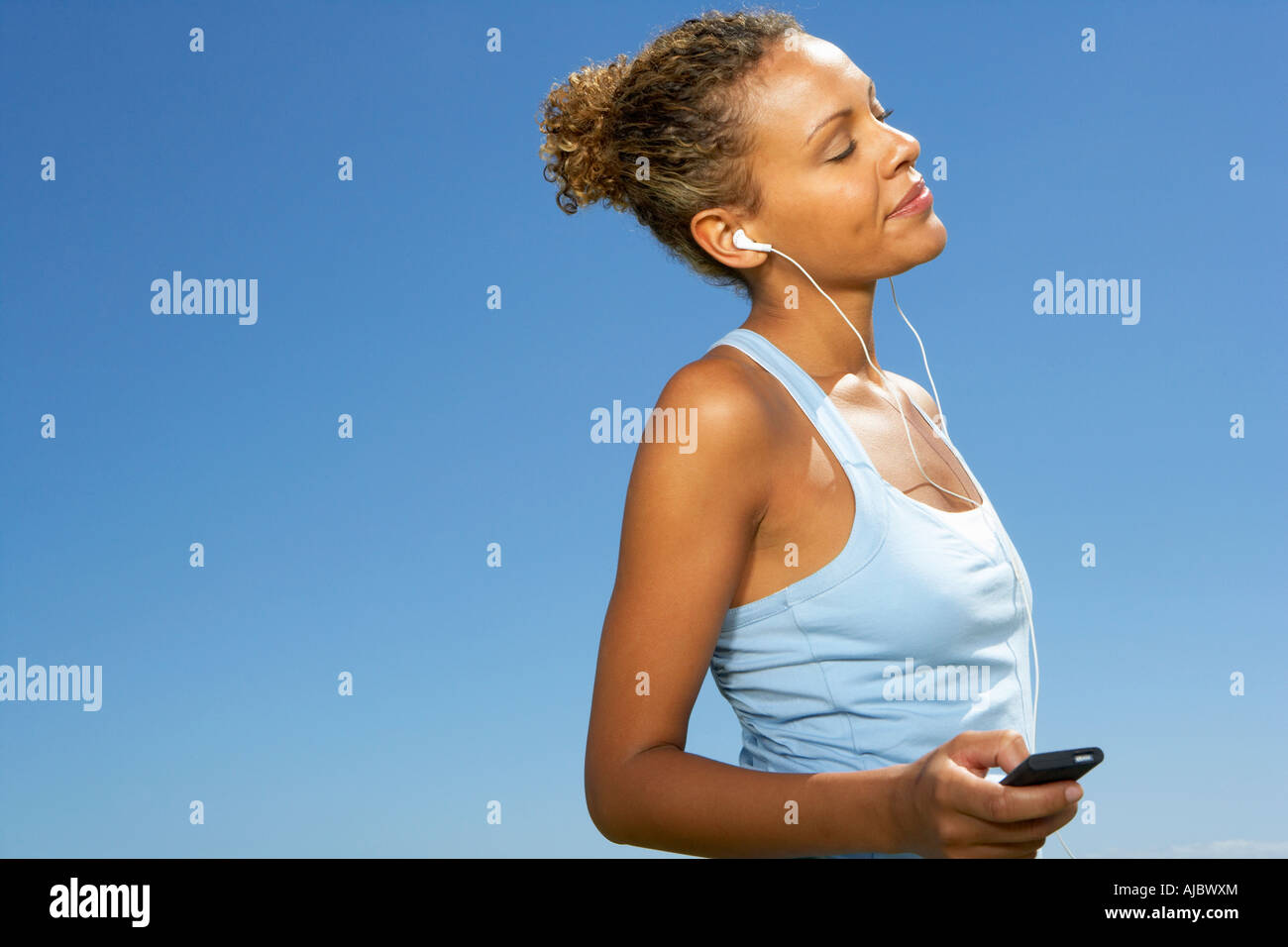 Woman Listening to Walkman - Side View Stock Photo - Alamy