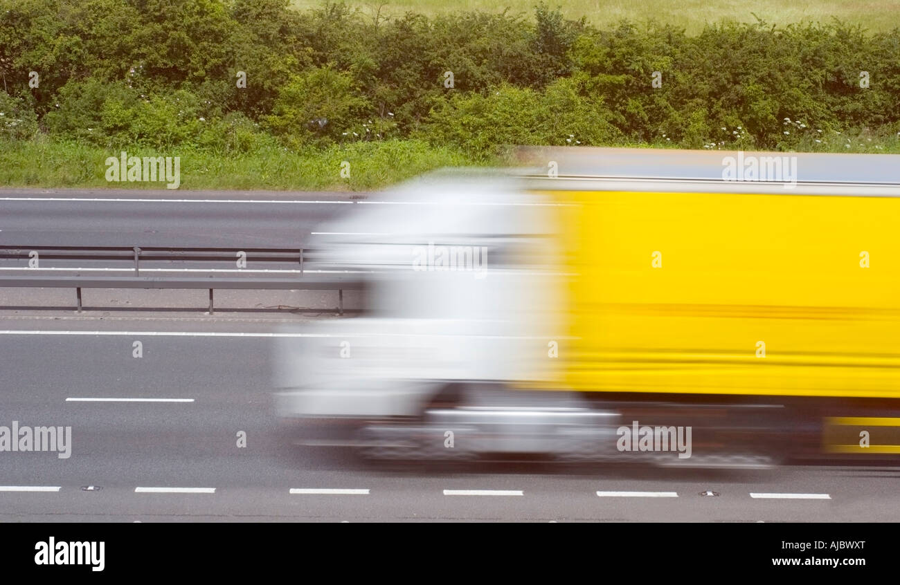 Yellow truck speeding down the motorway Stock Photo - Alamy Yellow truck speeding down the motorway Stock Photo - Alamy