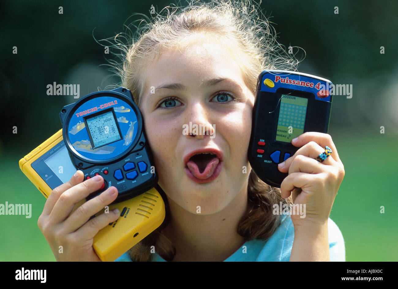 girl with gameboys Stock Photo - Alamy