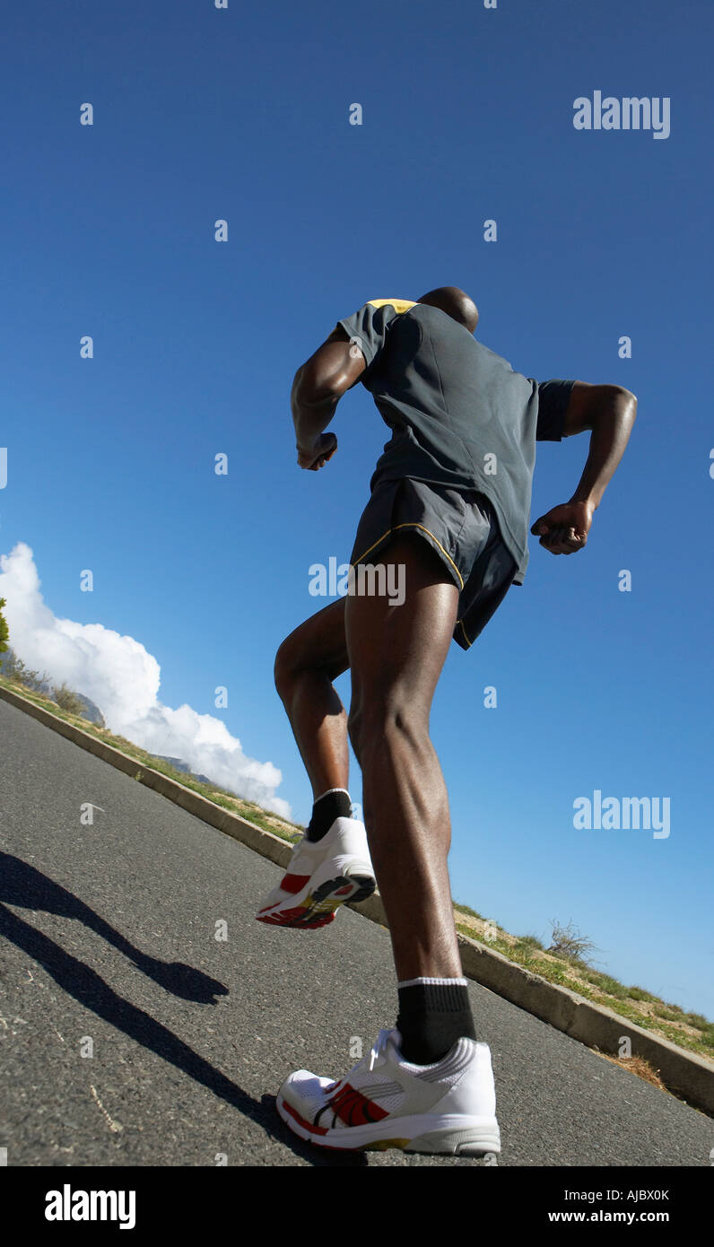 Rear view of three men running hi-res stock photography and images - Alamy