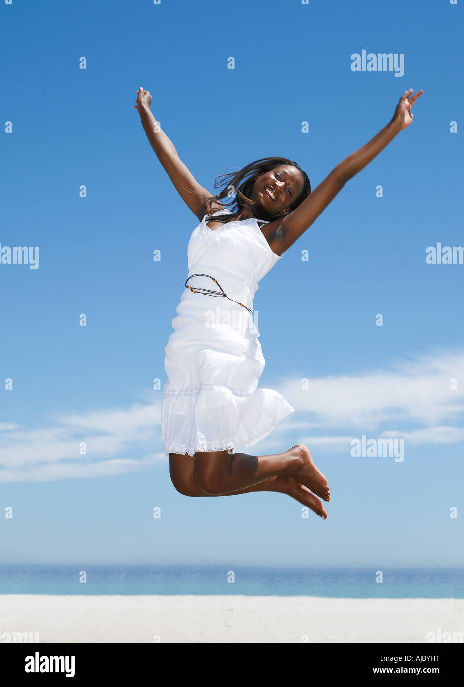 African Woman Jumping Stock Photo - Alamy