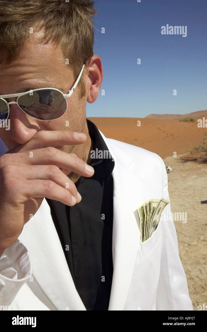 The man in the white suit hi-res stock photography and images - Alamy