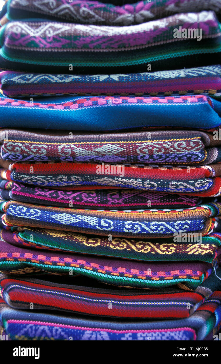 A stack of woven textiles Otavalo is one of Ecuador s most popular ...