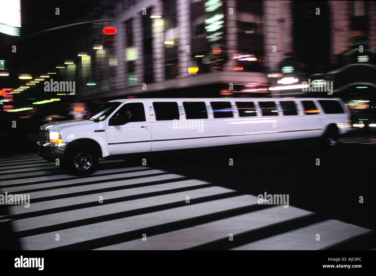 4x4 white stretched limousine in Times Square, New York city. USA Stock ...