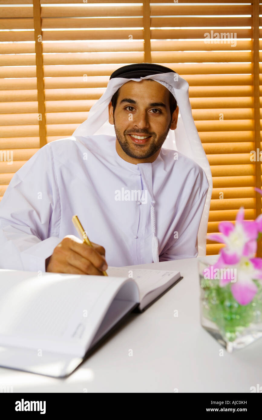 Arab man smiling hi-res stock photography and images - Alamy