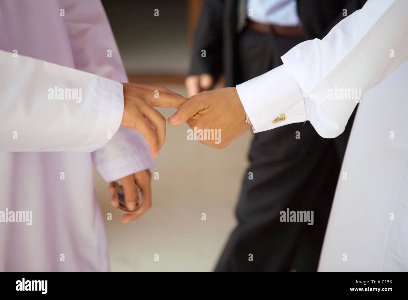 Arab men greeting other hi-res stock photography and images - Alamy