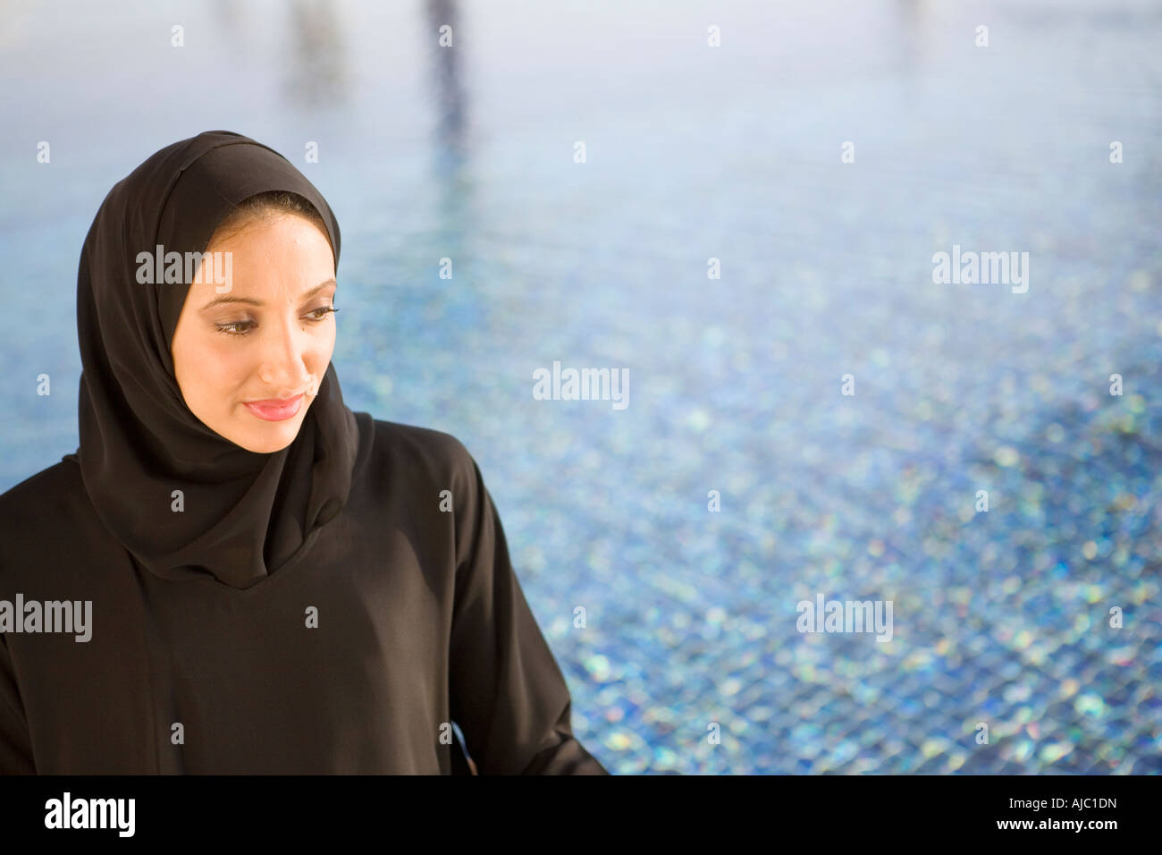 Dubai woman pool hi-res stock photography and images - Alamy