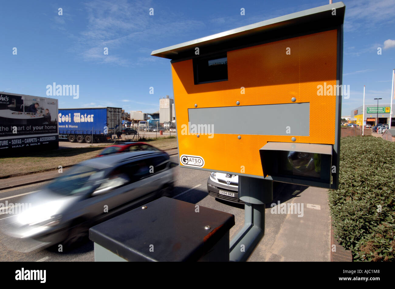 speed camera [30mph zone] car passing blur fast Stock Photo - Alamy