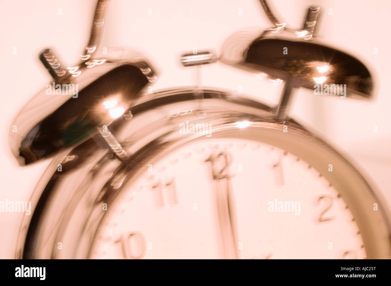 Ringing Alarm Clock - Blurred Stock Photo - Alamy